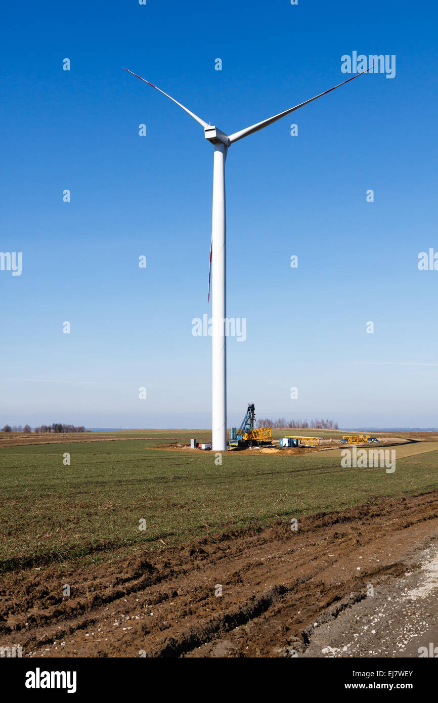 Wind turbine generator of green alternative energy, rural landscape ...