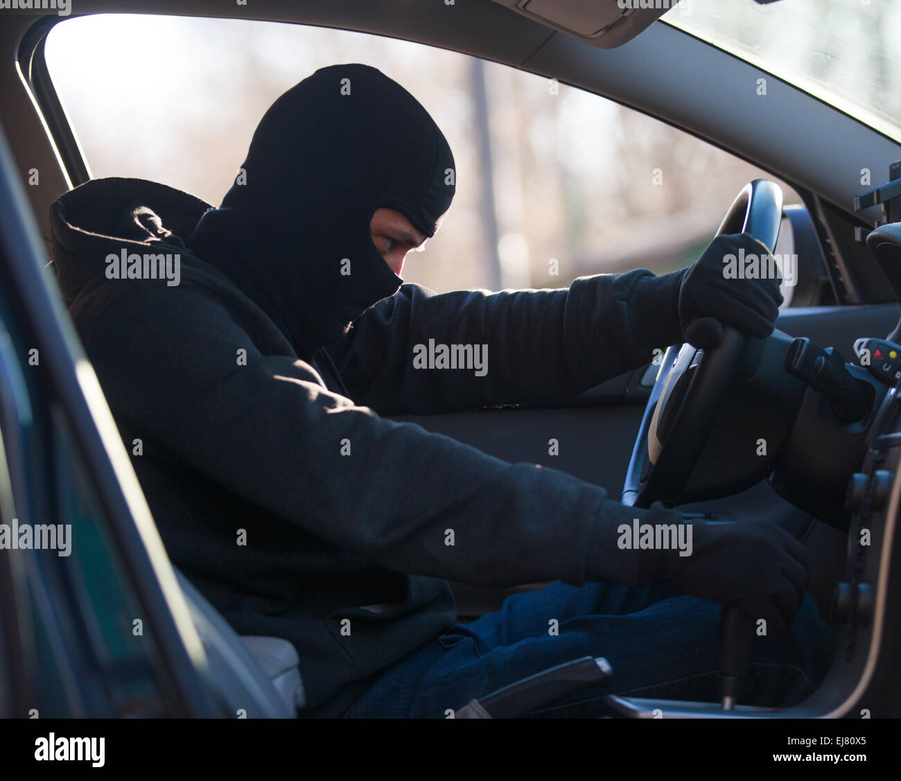 Young men car crime hi-res stock photography and images - Alamy
