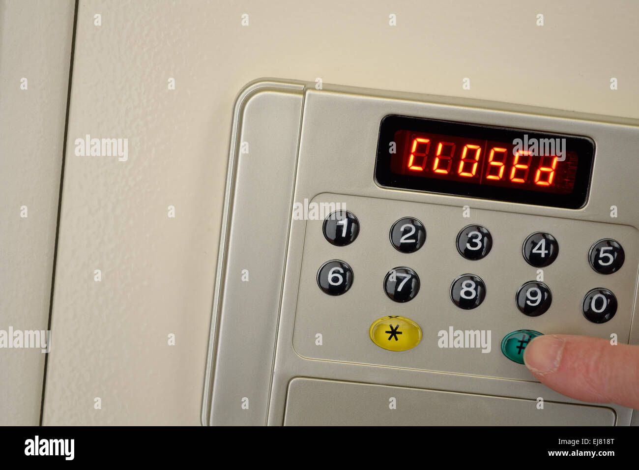 Person locked safe with code Stock Photo - Alamy