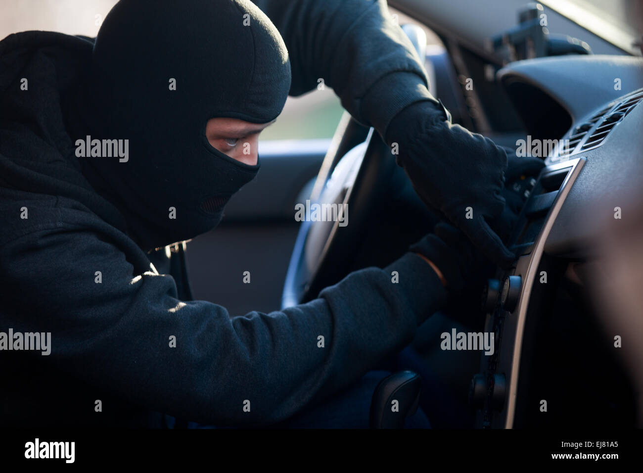 Young men car crime hi-res stock photography and images - Alamy