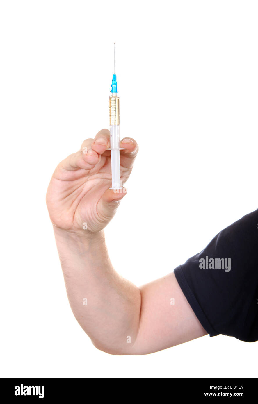 Syringe in a Hand Stock Photo - Alamy