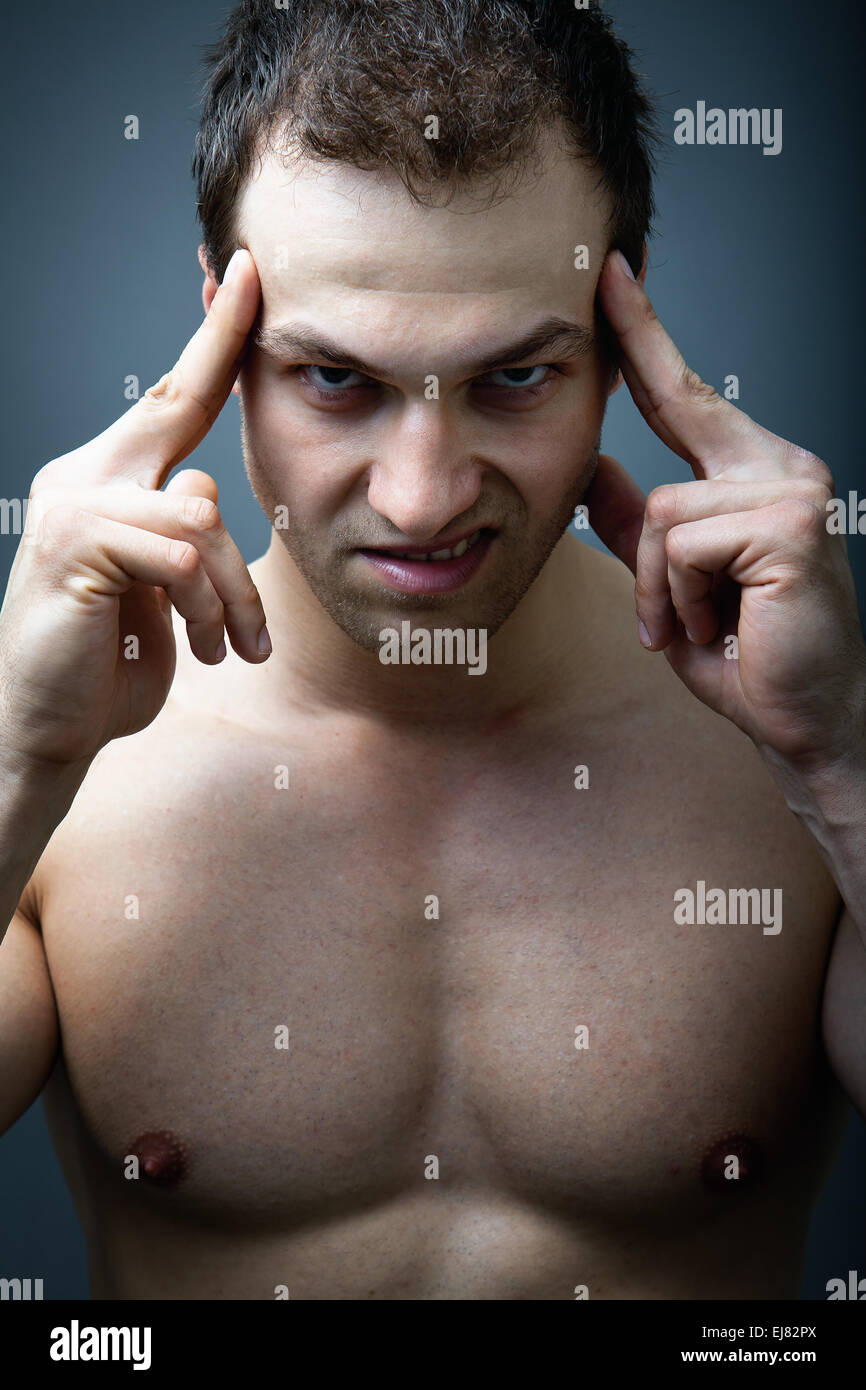 Evil scary man looking very angry Stock Photo - Alamy