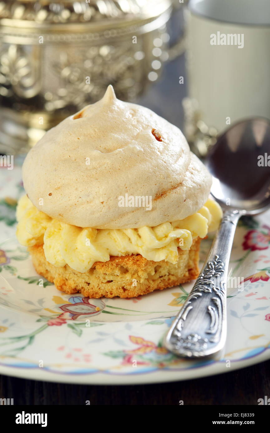 Meringue cake with tea Stock Photo - Alamy