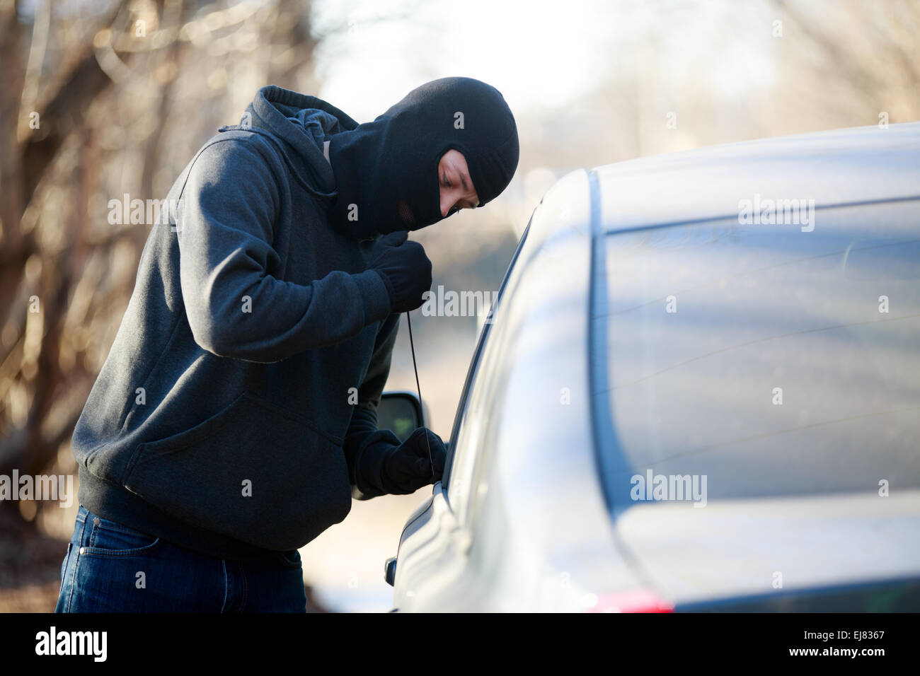 Car robbing hi-res stock photography and images - Alamy