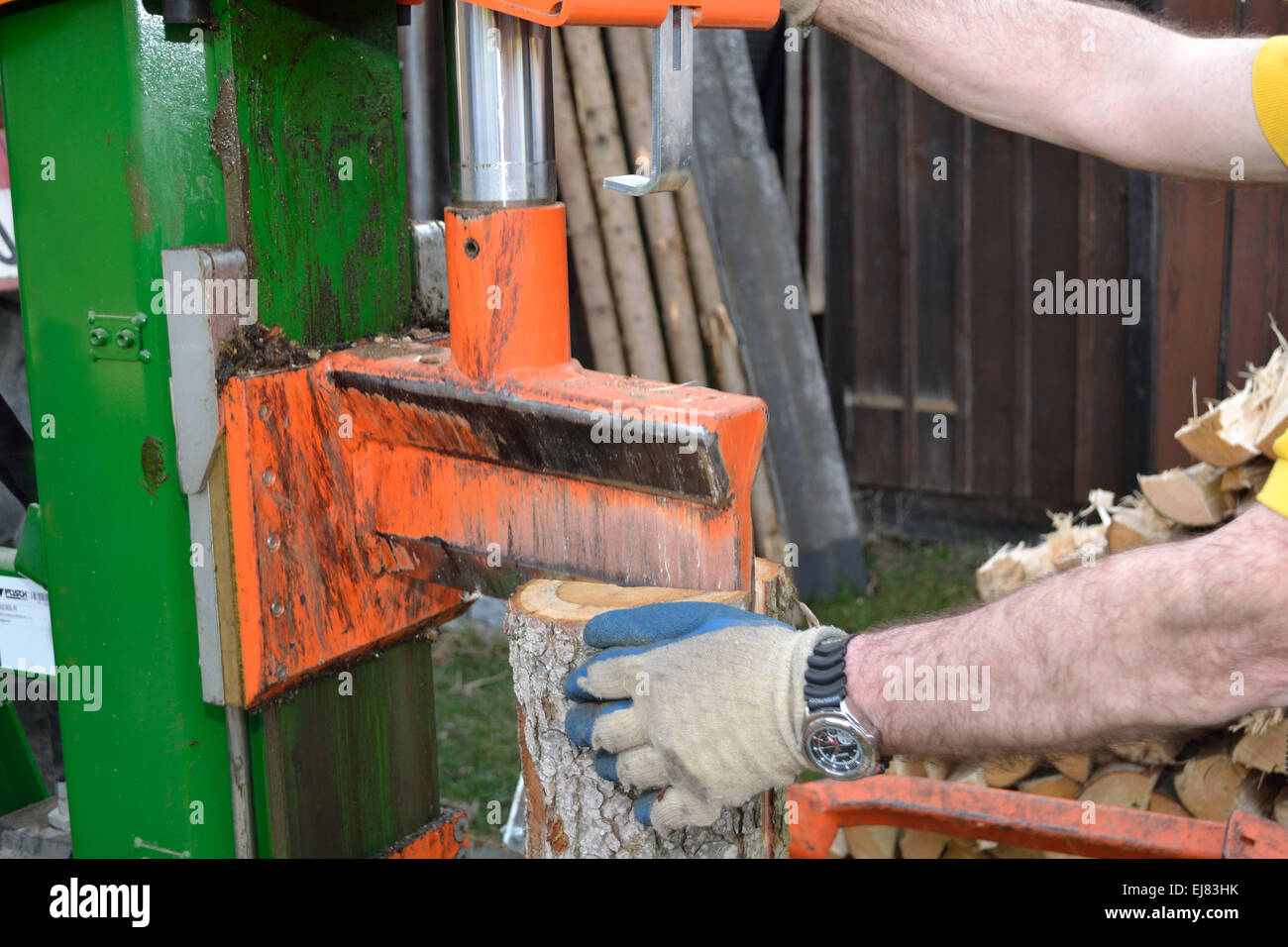 Man in wooden columns Stock Photo - Alamy