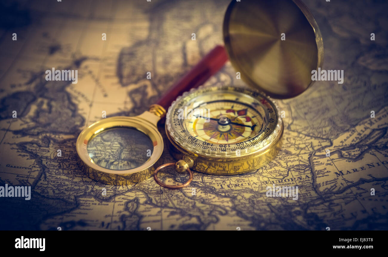 compass and magnifying glass Stock Photo - Alamy