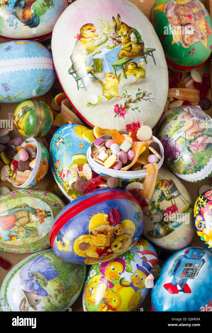 Brightly coloured paper easter eggs with sweets Stock Photo - Alamy