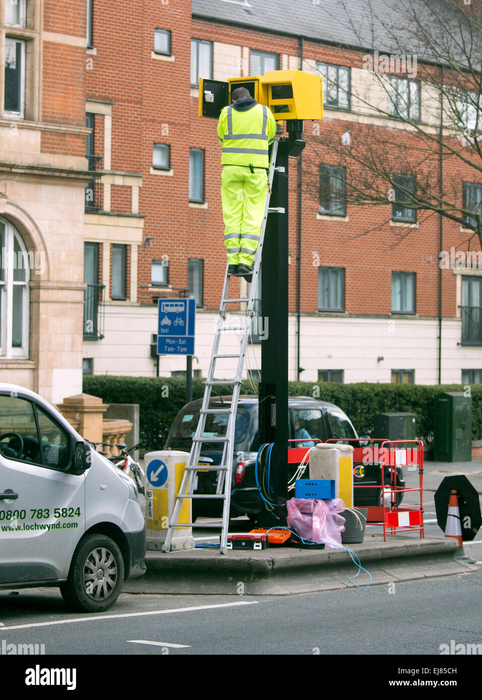 Digital speed camera being installed Stock Photo - Alamy