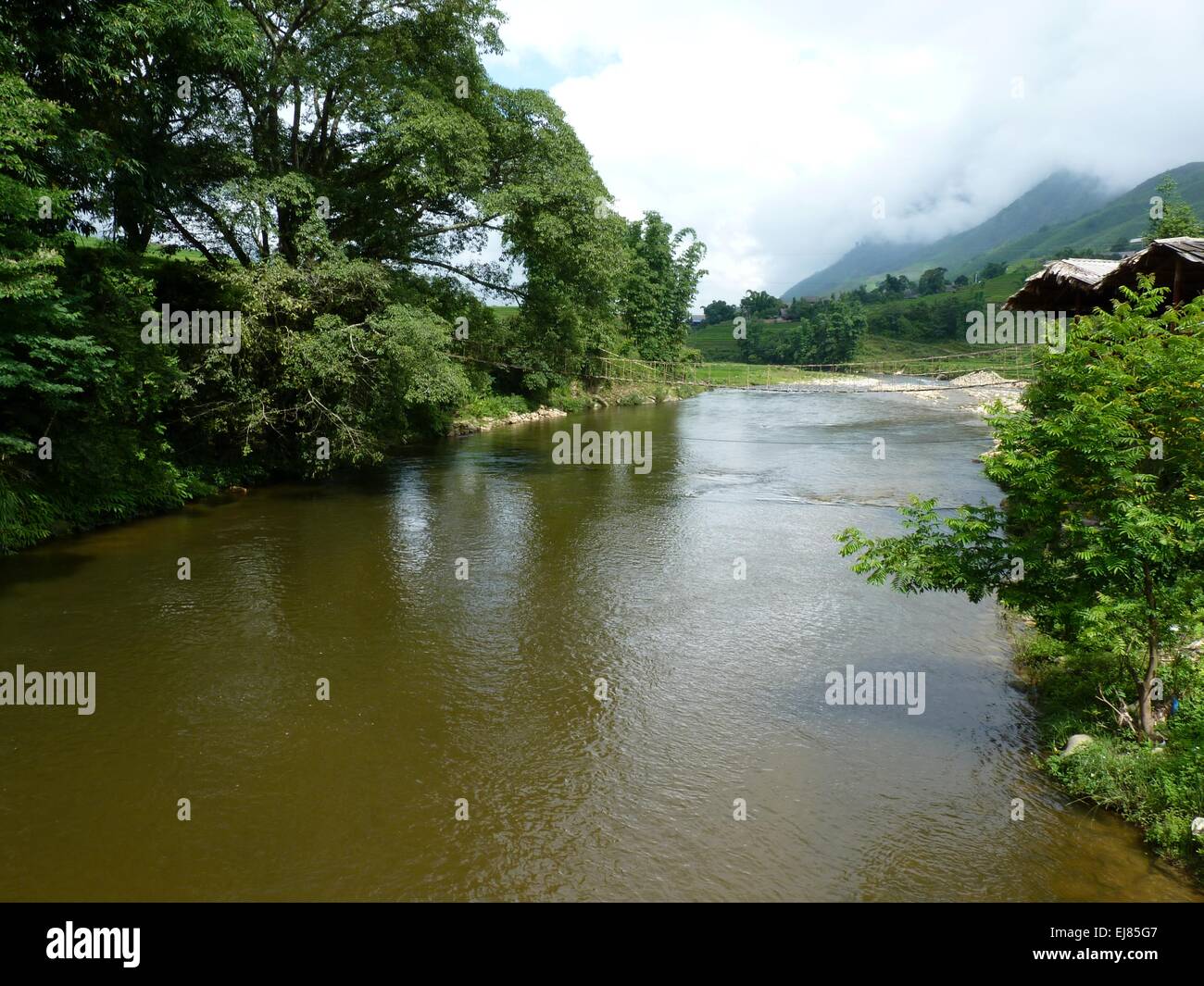 River in a village Stock Photo - Alamy