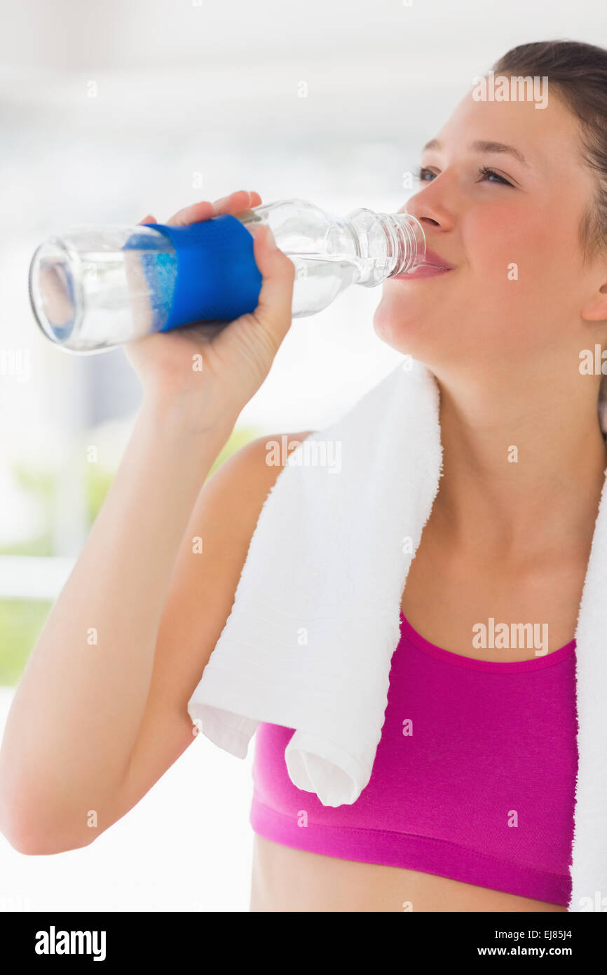 Woman in gym drinking water hi-res stock photography and images - Alamy