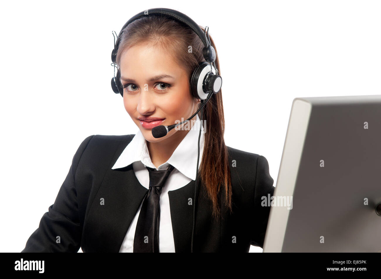 girl with a headset works at the computer Stock Photo - Alamy