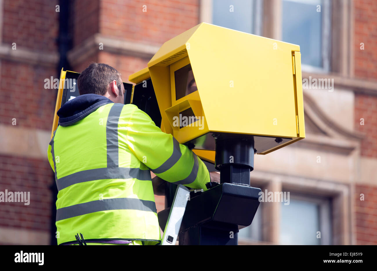 Digital speed camera being installed Stock Photo - Alamy