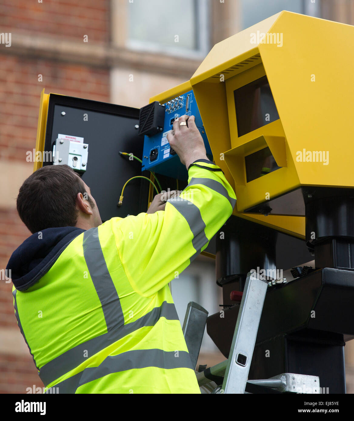 Digital speed camera being installed Stock Photo - Alamy