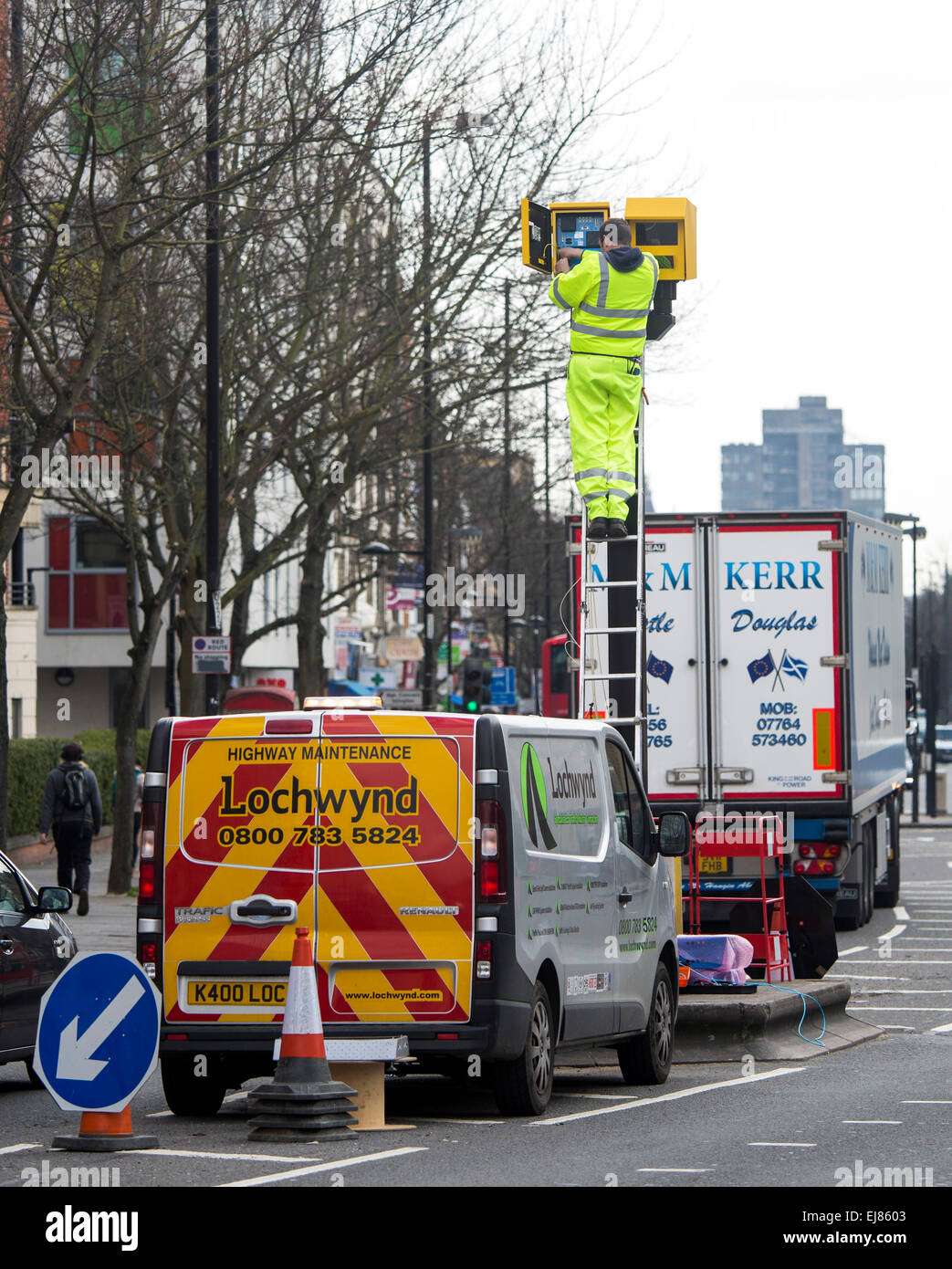 Digital speed camera being installed Stock Photo - Alamy