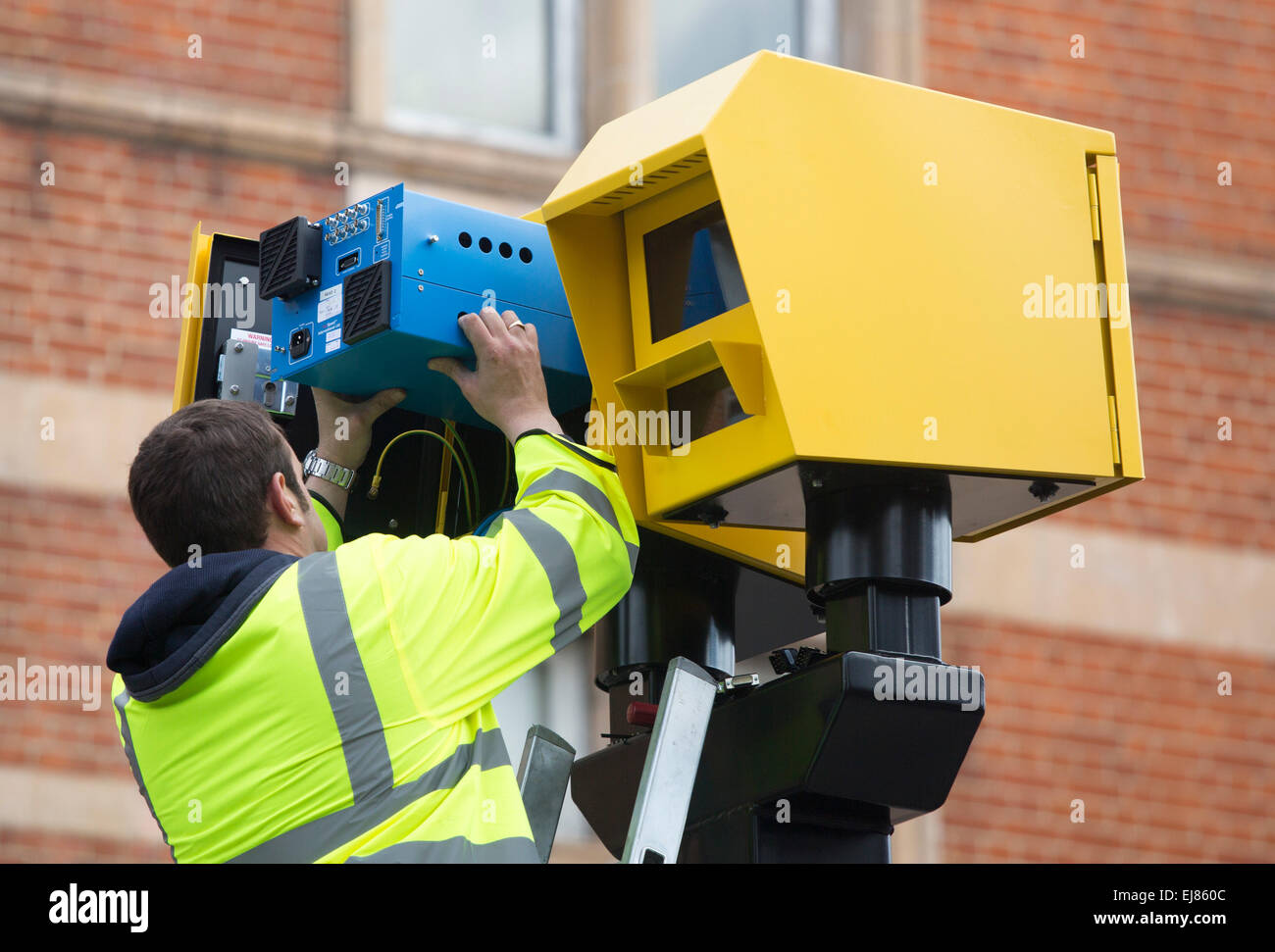Digital speed camera being installed Stock Photo - Alamy