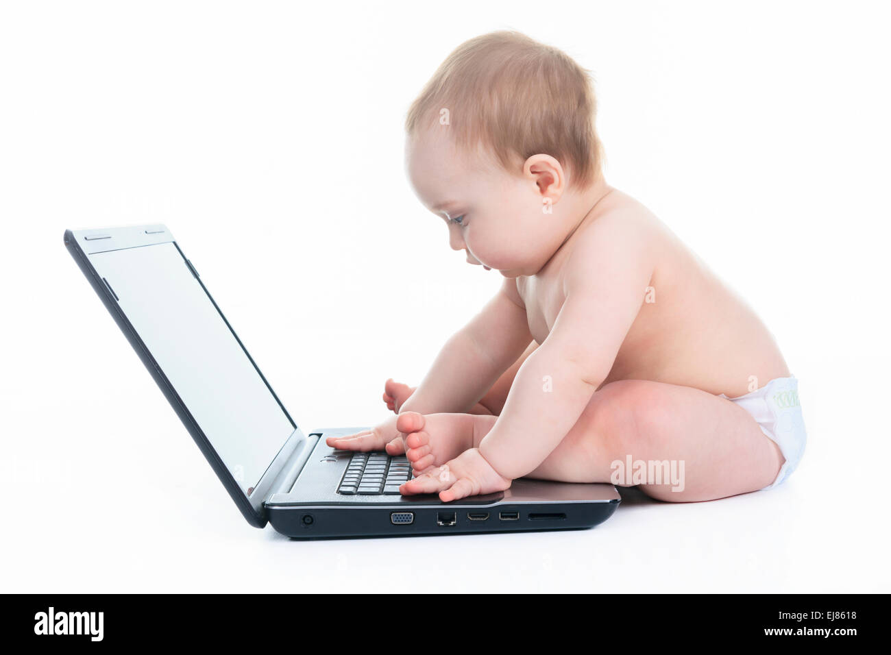 Baby using laptop over white background Stock Photo - Alamy