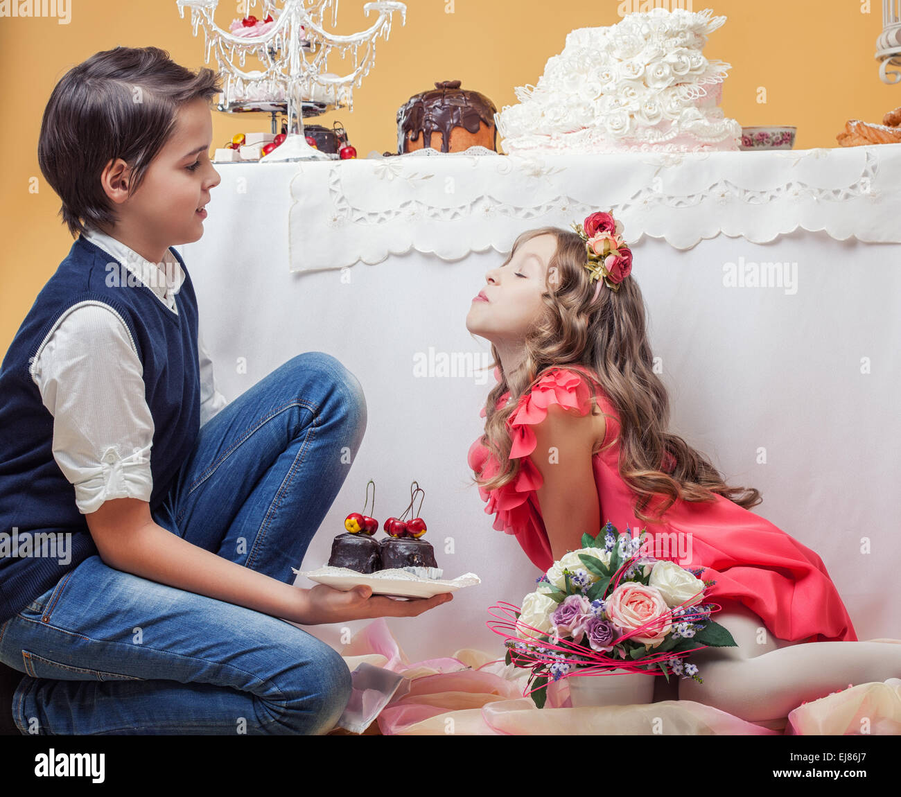 Enchanting children posing in studio Stock Photo - Alamy