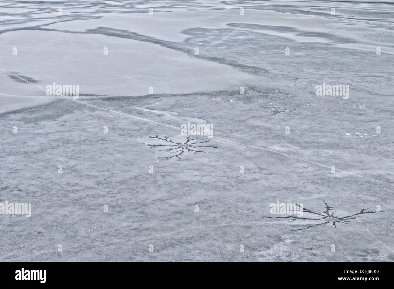 Impact in the ice Stock Photo - Alamy