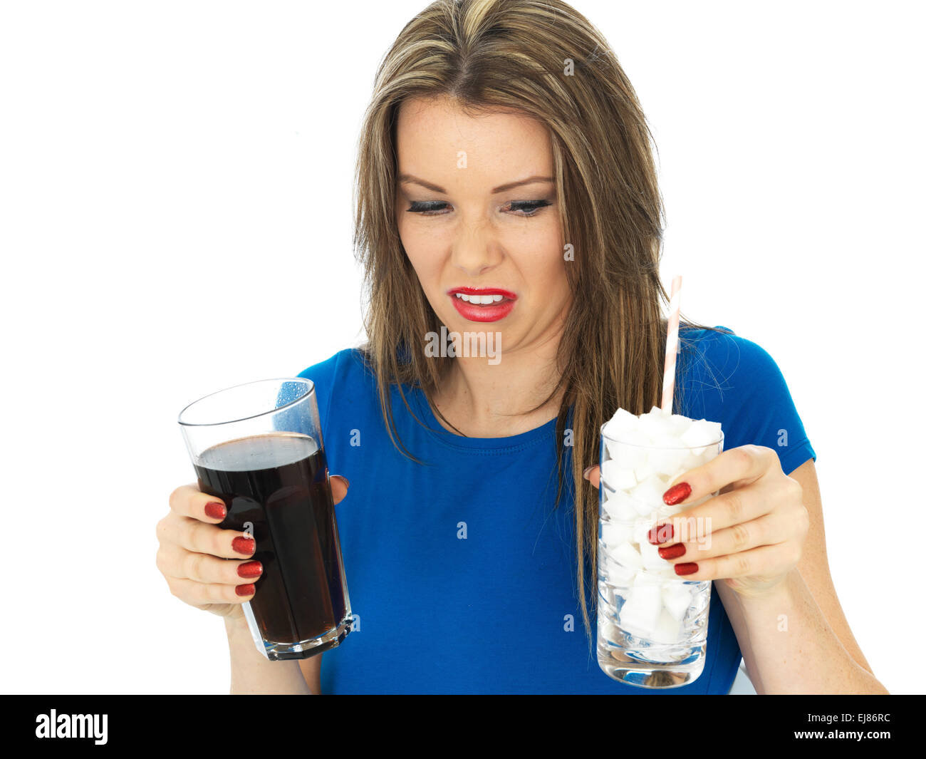 Attractive Young Woman Drinking High Sugar Fizzy Drink Stock Photo - Alamy