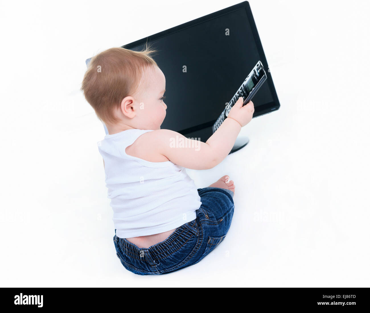 Happy toddler boy holding Cut Out Stock Images & Pictures - Alamy