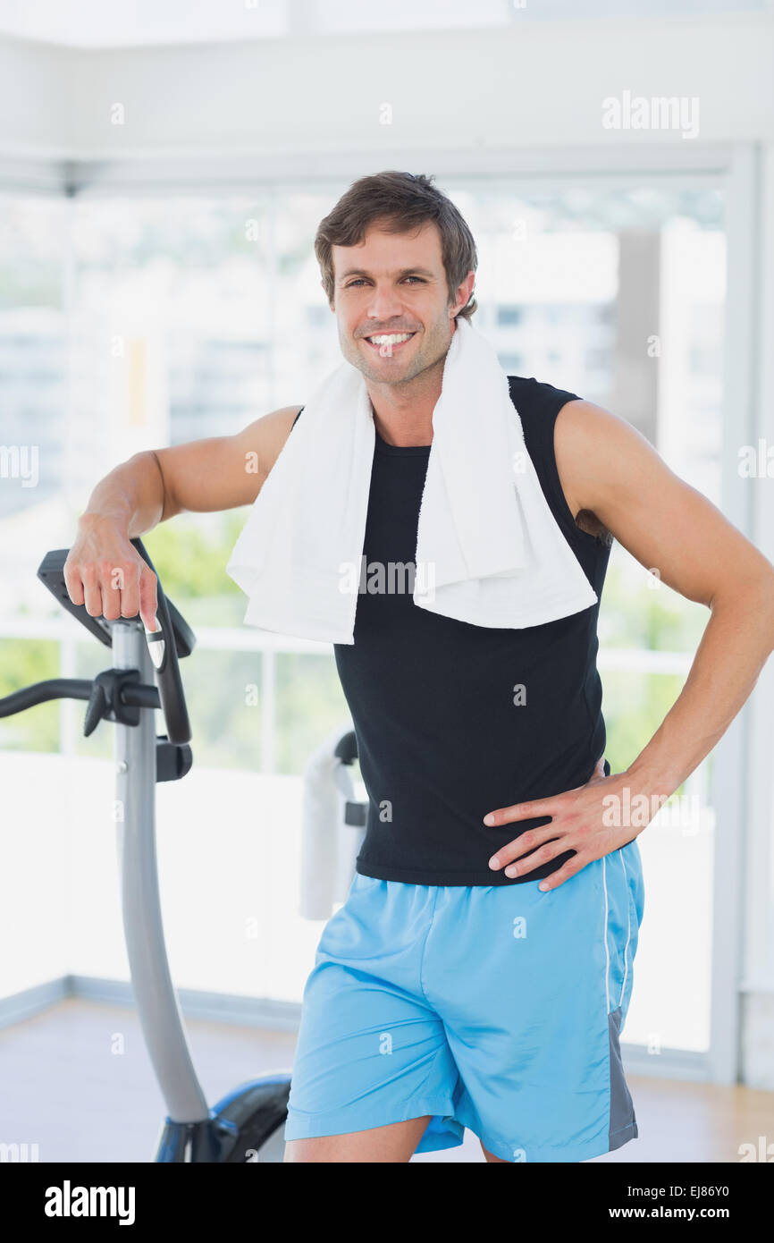 Portrait of a smiling man at spinning class in bright gym Stock Photo ...