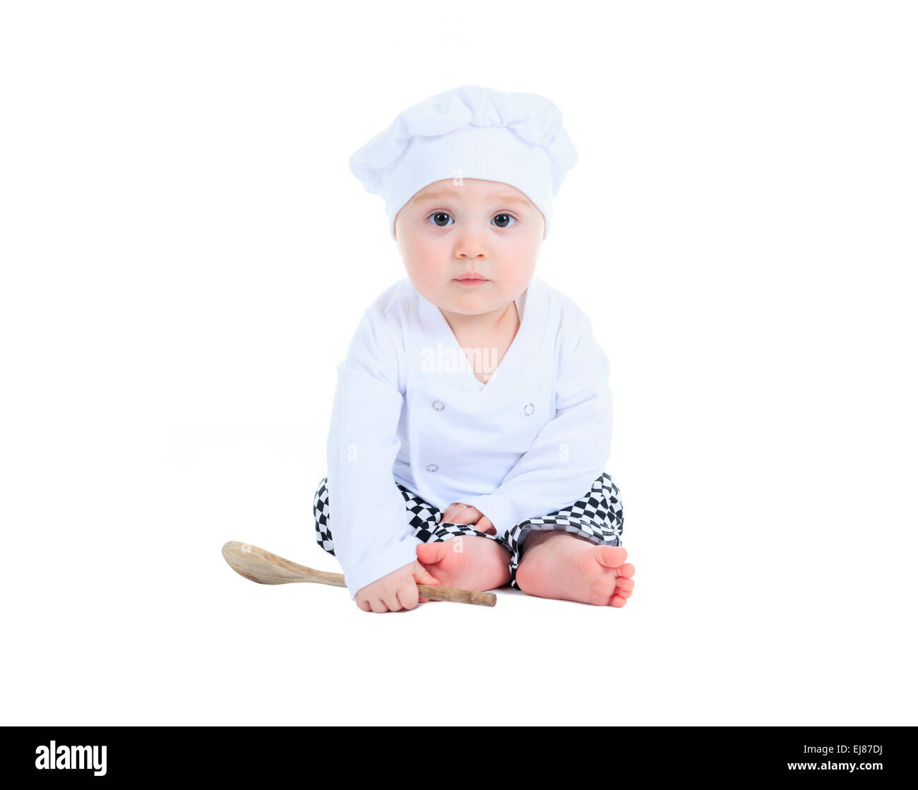 Cute little cook boy in front of a white background Stock Photo - Alamy