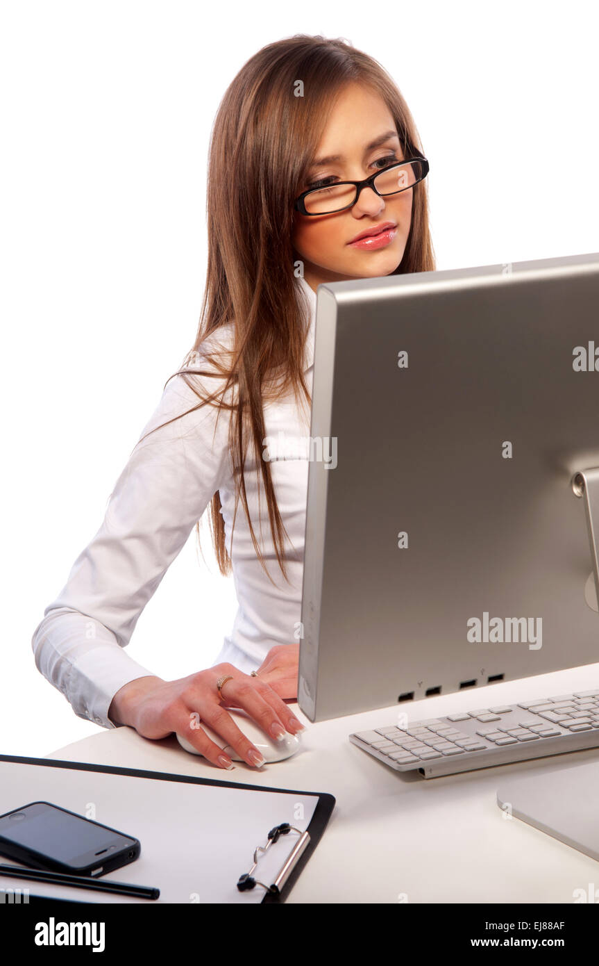 pretty girl works on a computer Stock Photo - Alamy