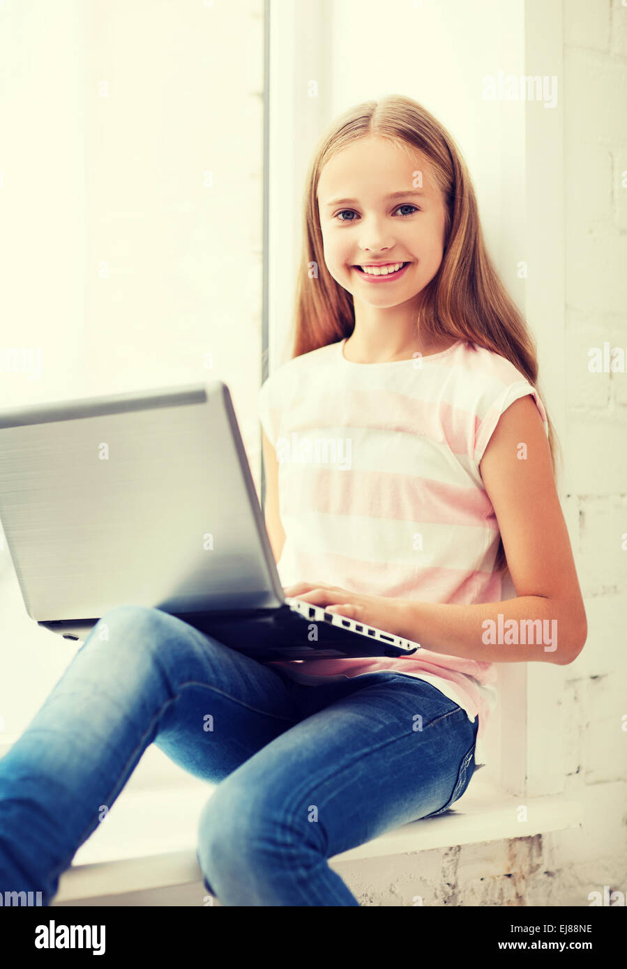 girl with laptop pc at school Stock Photo - Alamy