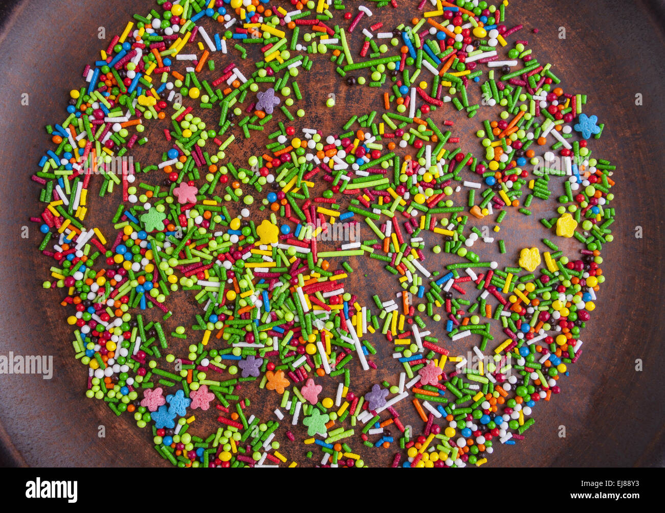 Plate with mini sweet sprinkles Stock Photo - Alamy