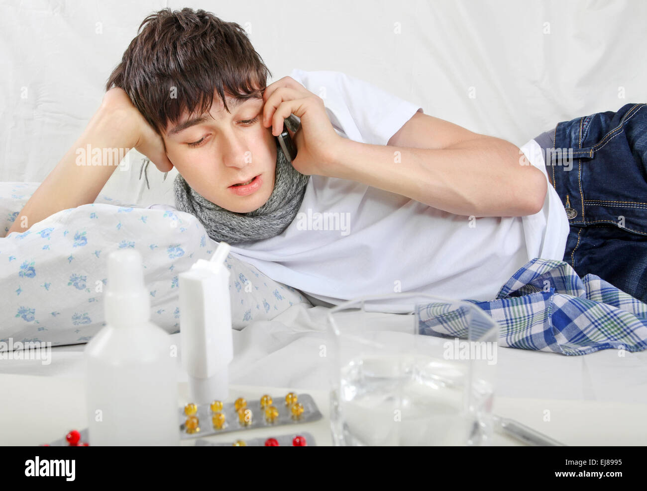 Sick Teenager calling on Cellphone Stock Photo - Alamy