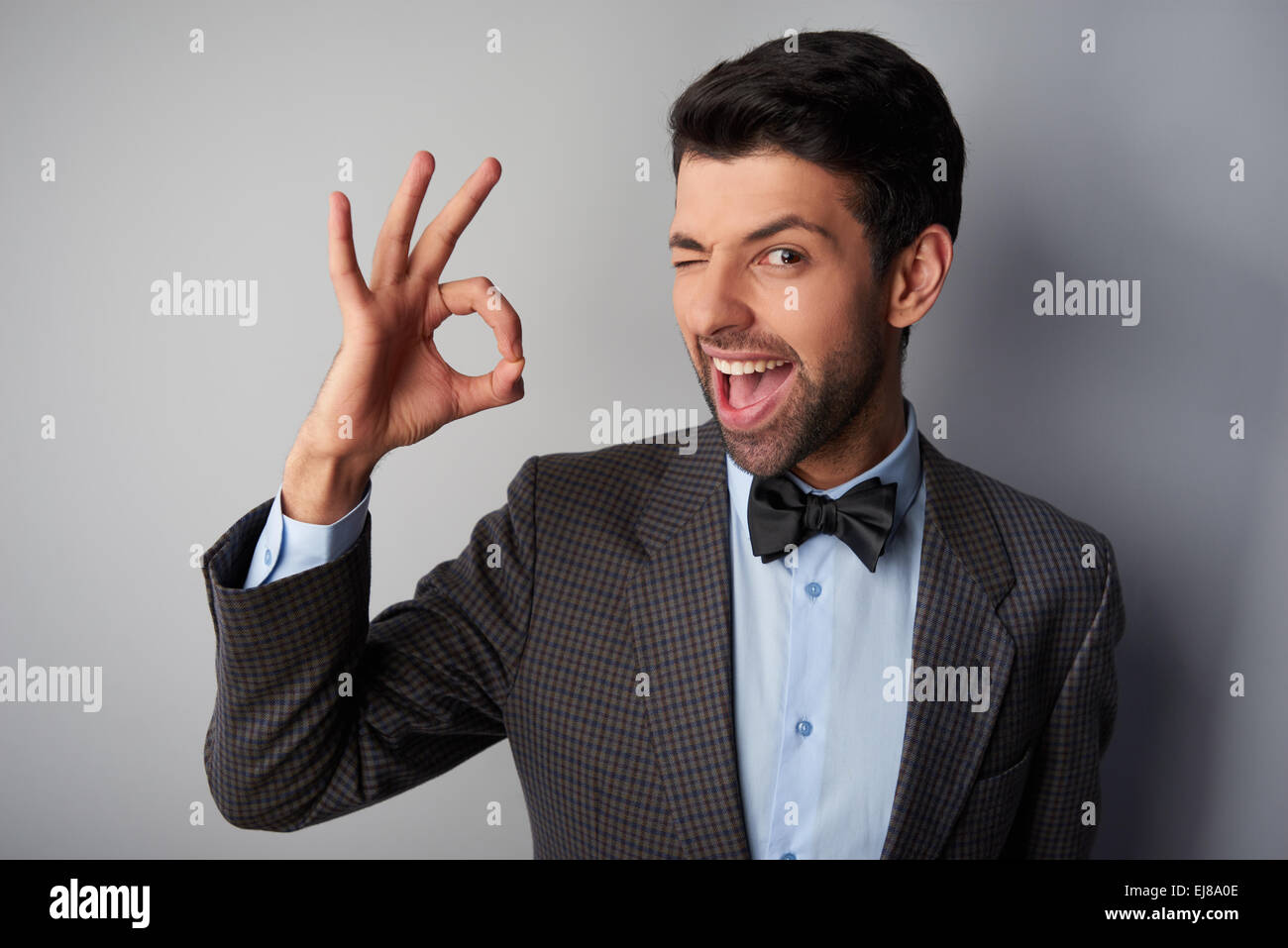 Man winking hi-res stock photography and images - Alamy