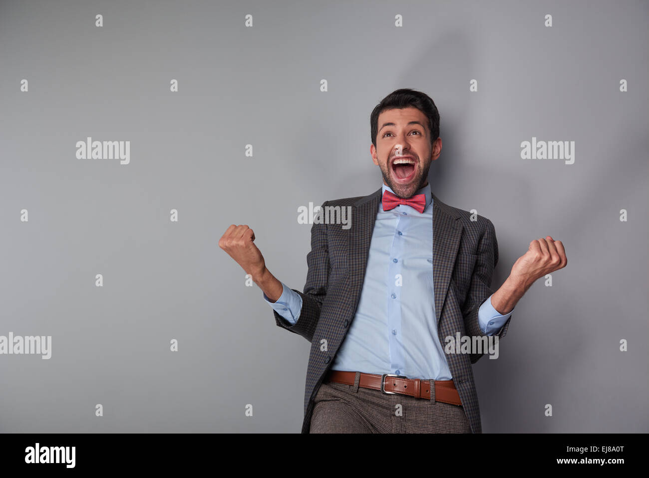 Man showing his happiness and success Stock Photo - Alamy