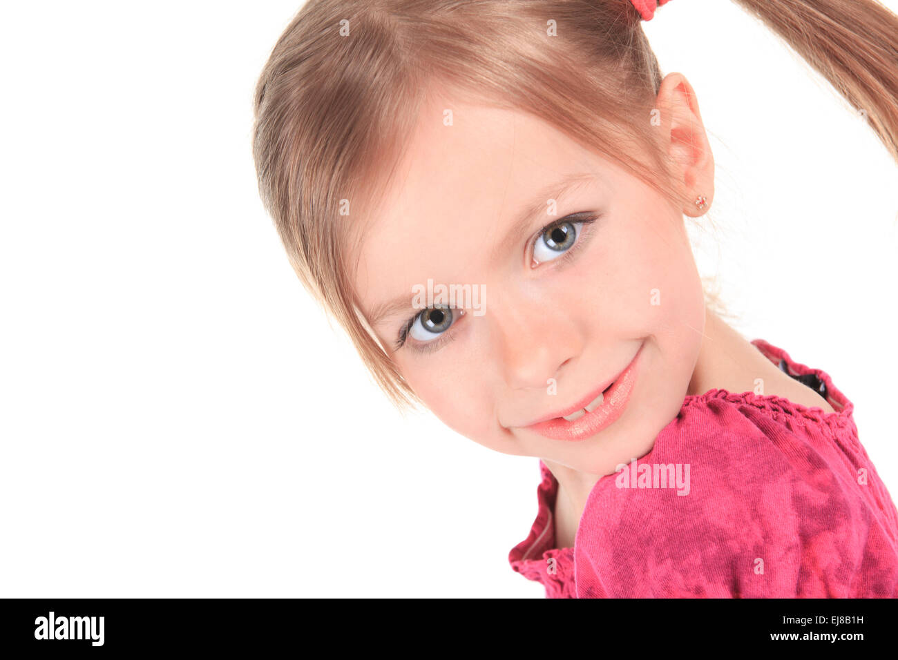 A beautiful girl child over a white background Stock Photo - Alamy
