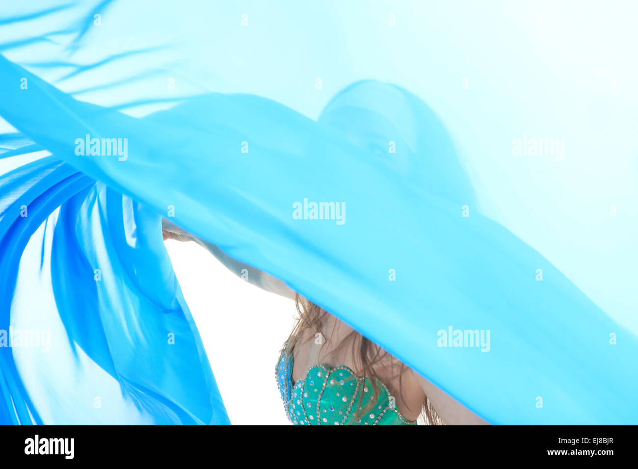 A belly dancer over a white background Stock Photo - Alamy