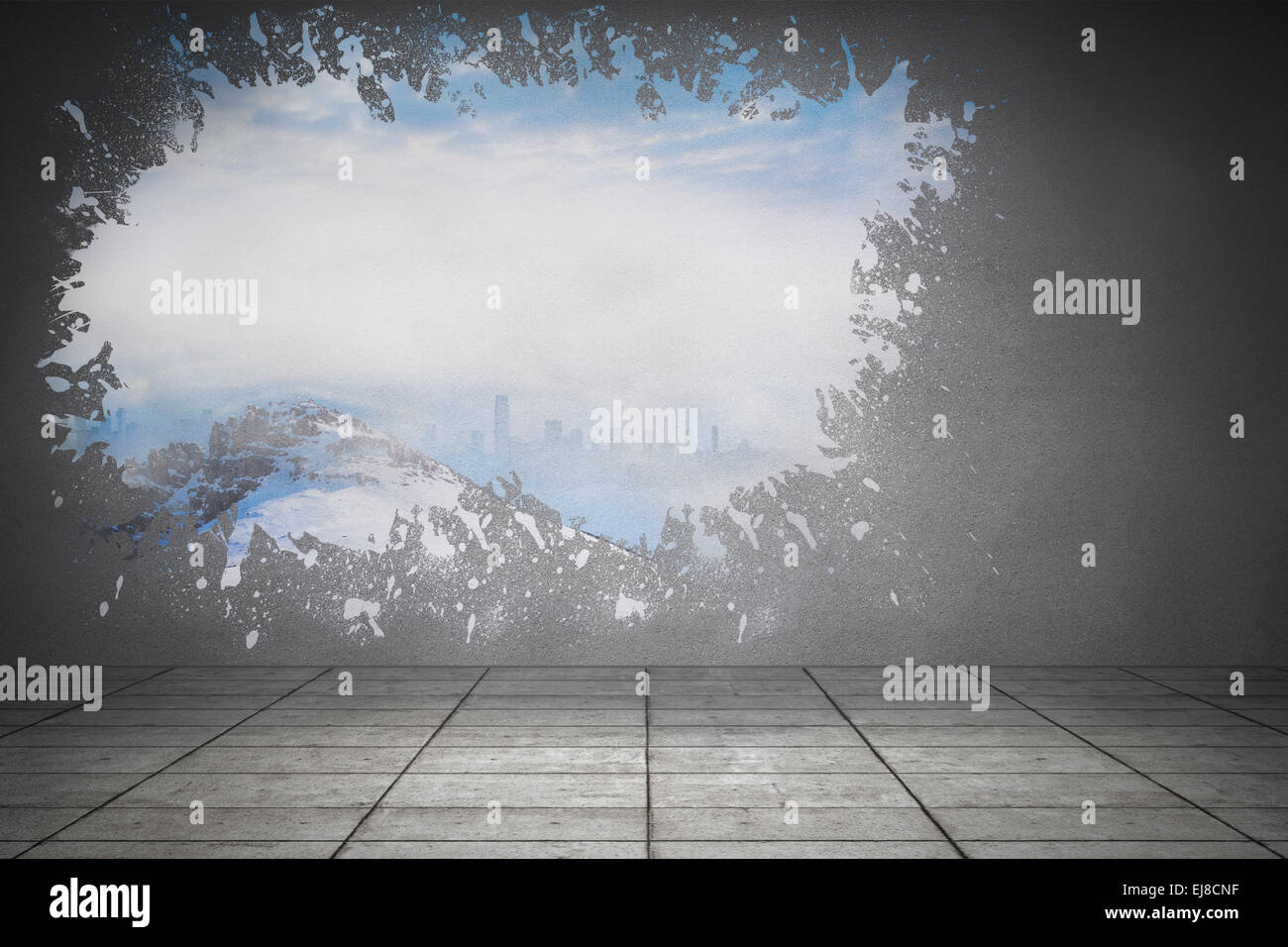 Splash on wall revealing snowy peak Stock Photo - Alamy
