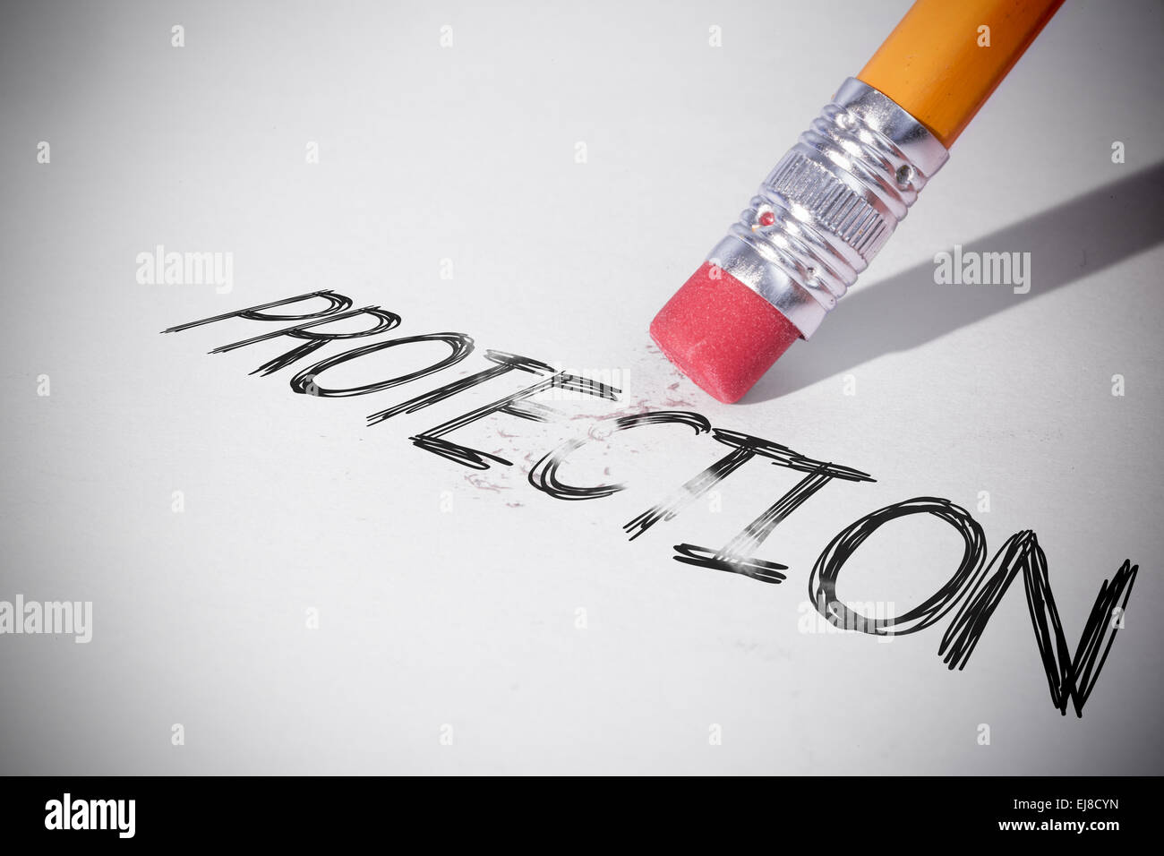 Pencil erasing the word Protection Stock Photo - Alamy