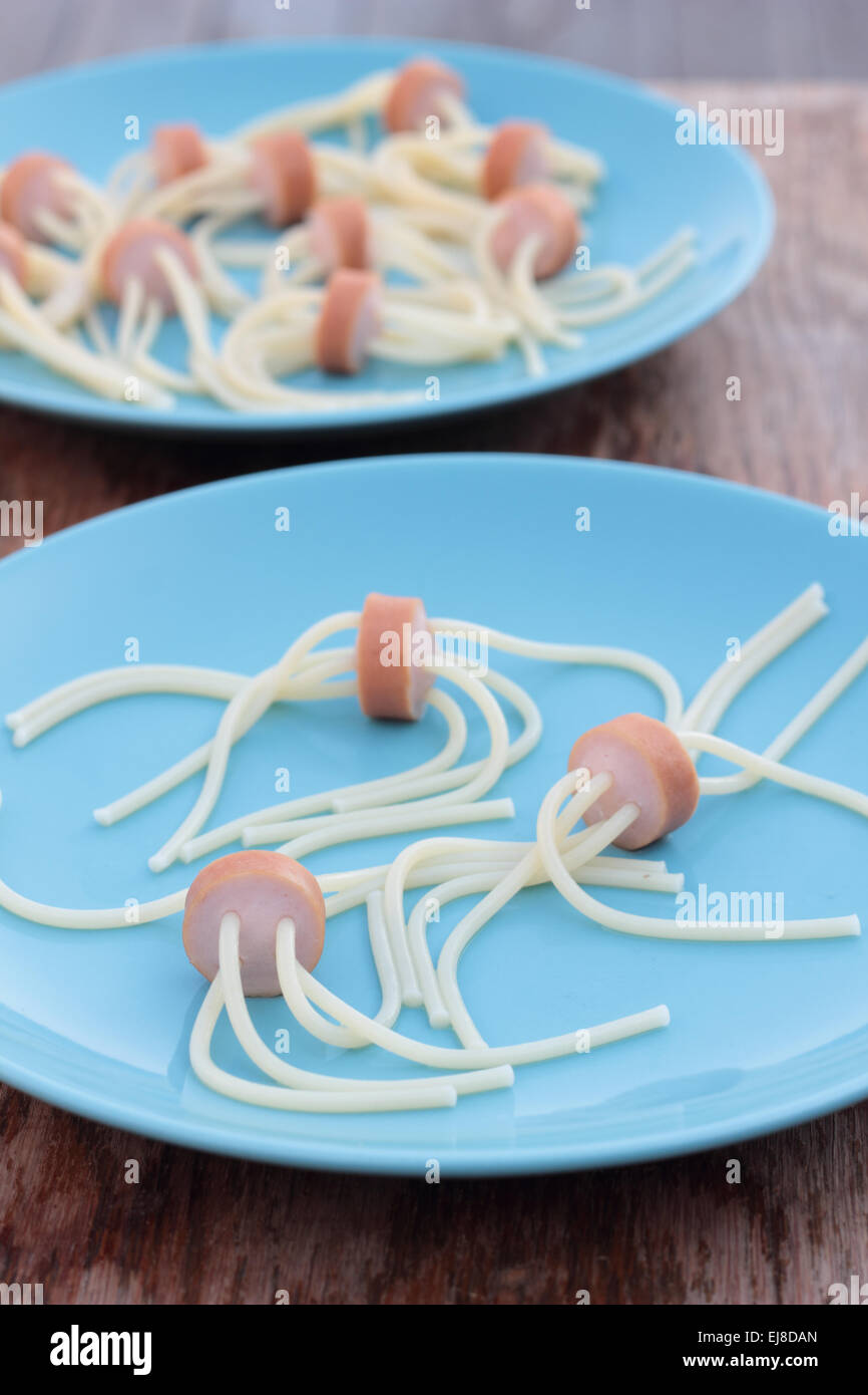Wiener and spaghetti funny snack for kids Stock Photo - Alamy