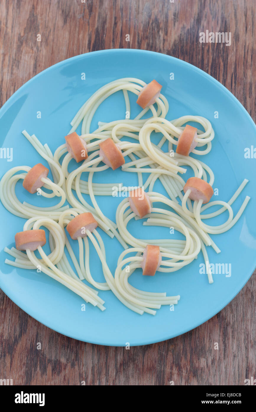 Wiener and spaghetti funny snack for kids Stock Photo - Alamy