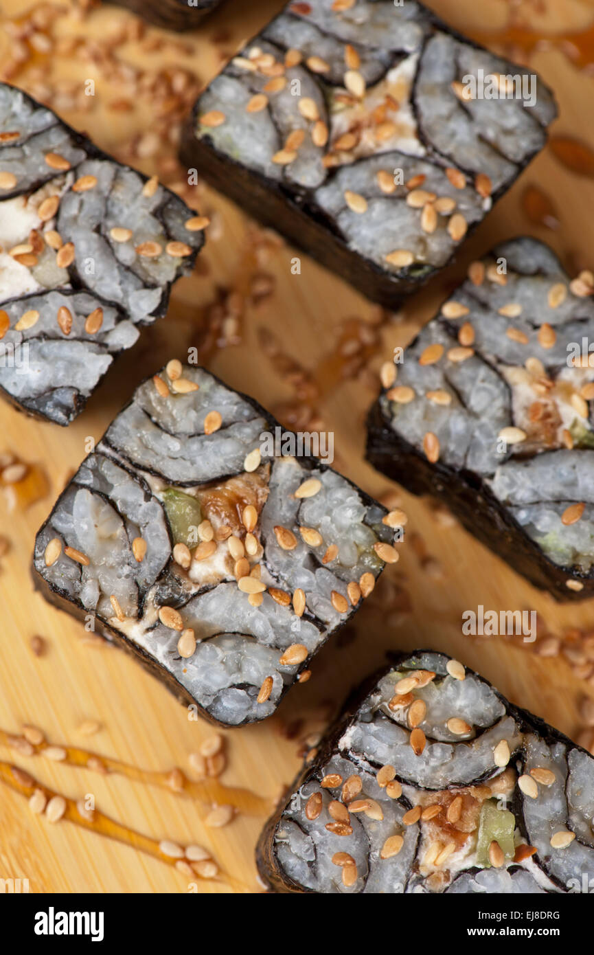 sesame sushi rolls Stock Photo - Alamy