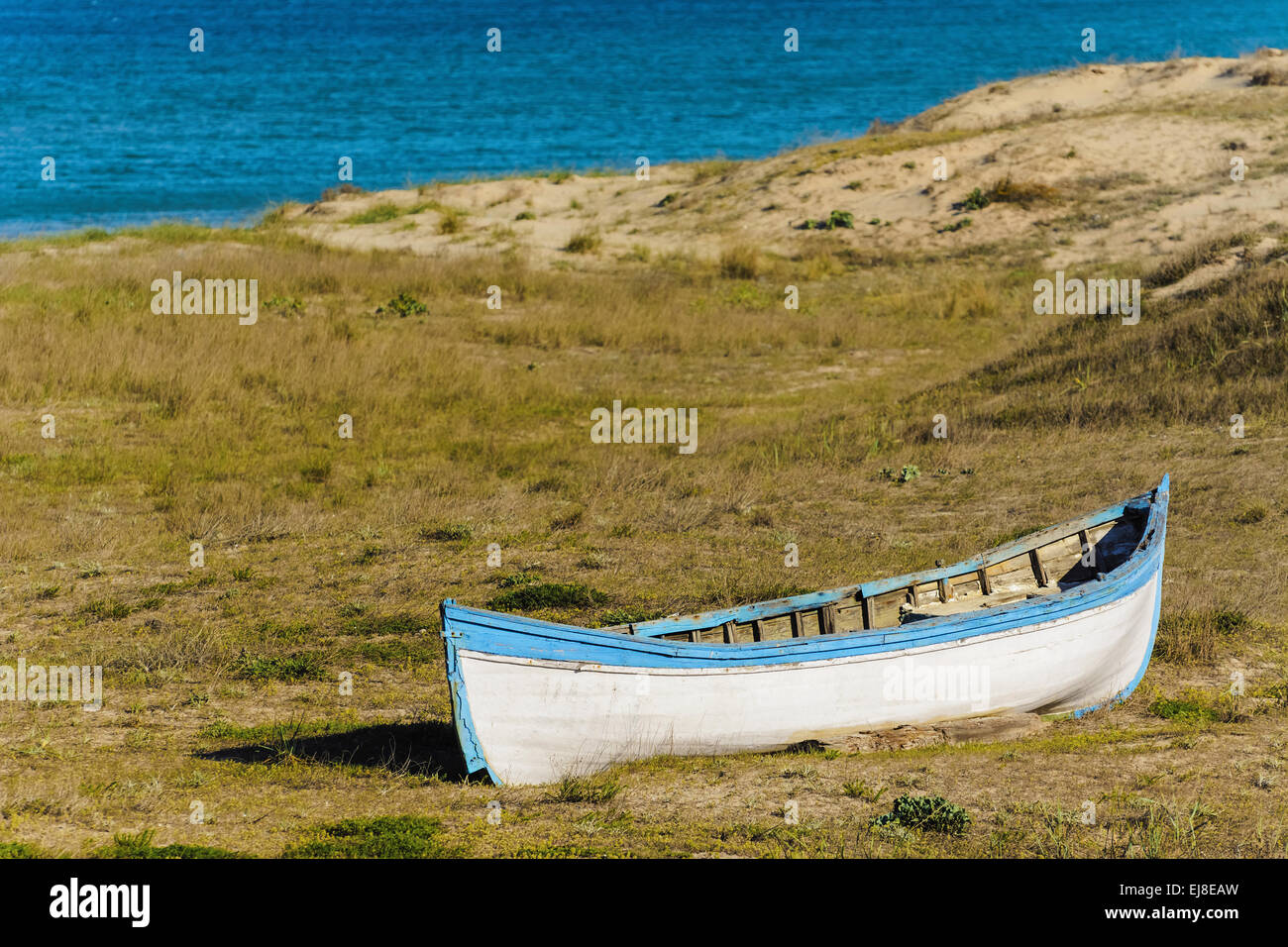 Empty wooden boat river bank hi-res stock photography and images - Alamy
