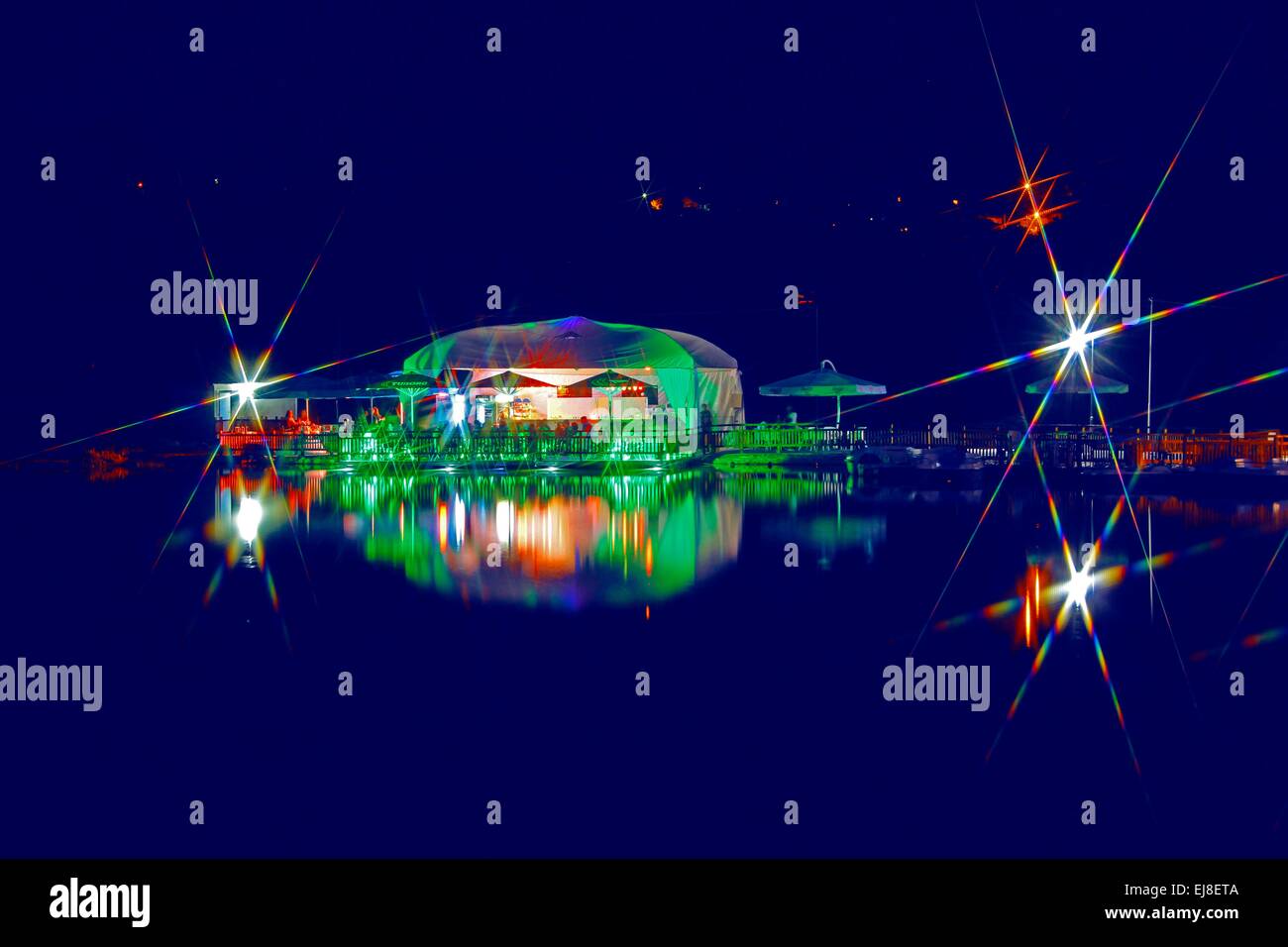 Night cafe reflection in the water Stock Photo - Alamy