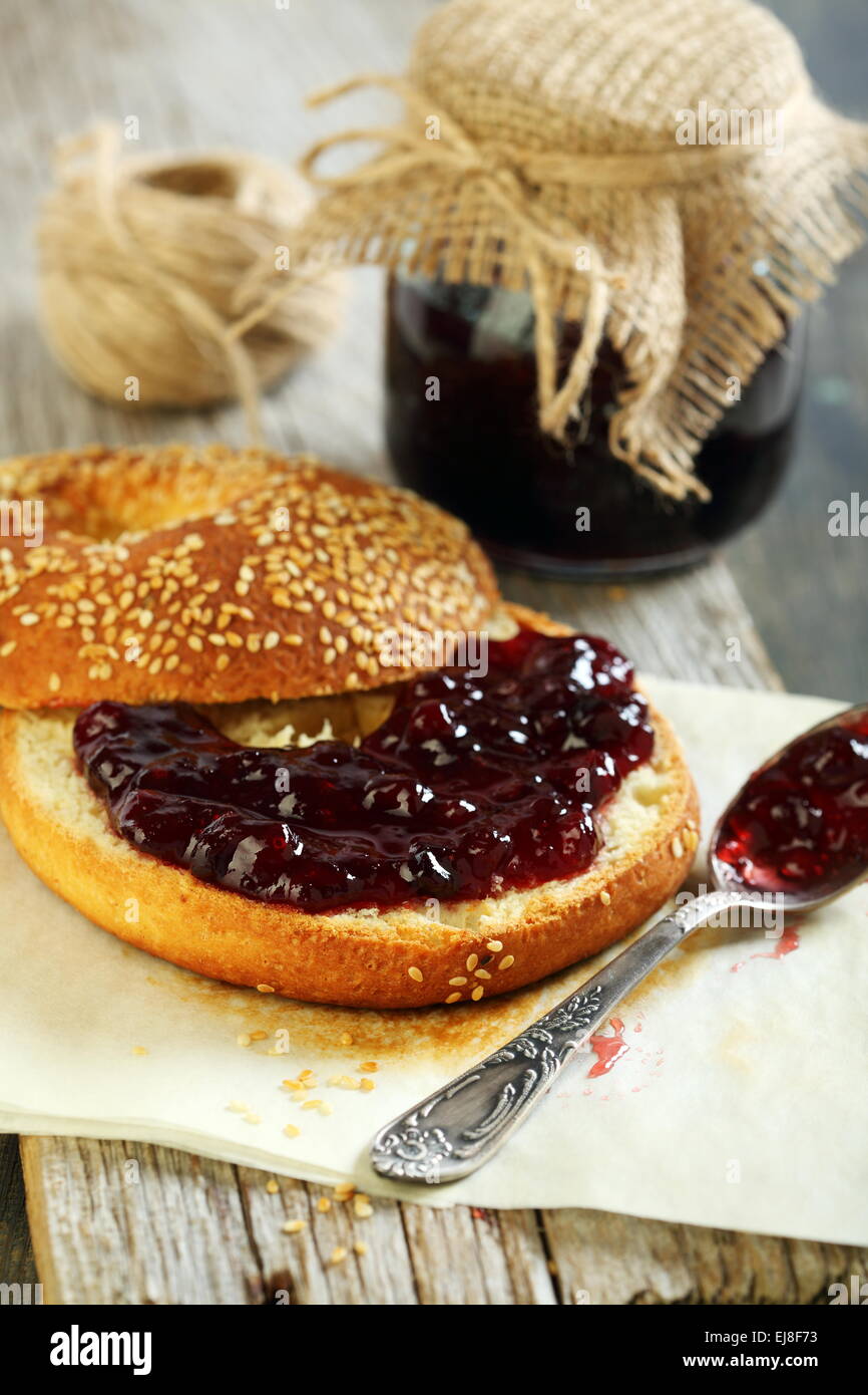 Homemade bagel with jam for breakfast Stock Photo - Alamy