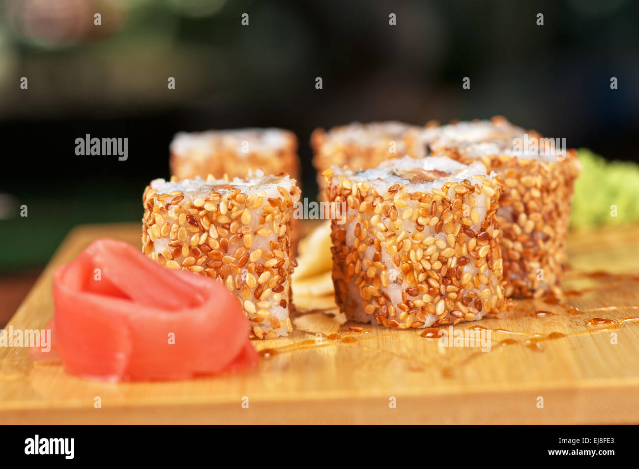 sesame sushi rolls Stock Photo - Alamy