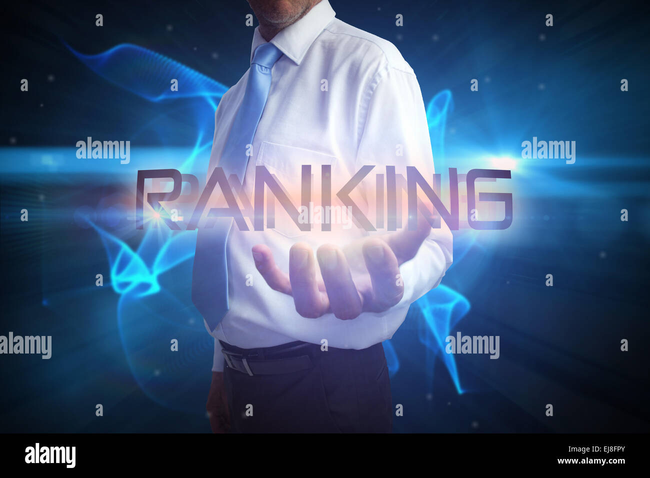 Businessman presenting the word ranking Stock Photo - Alamy