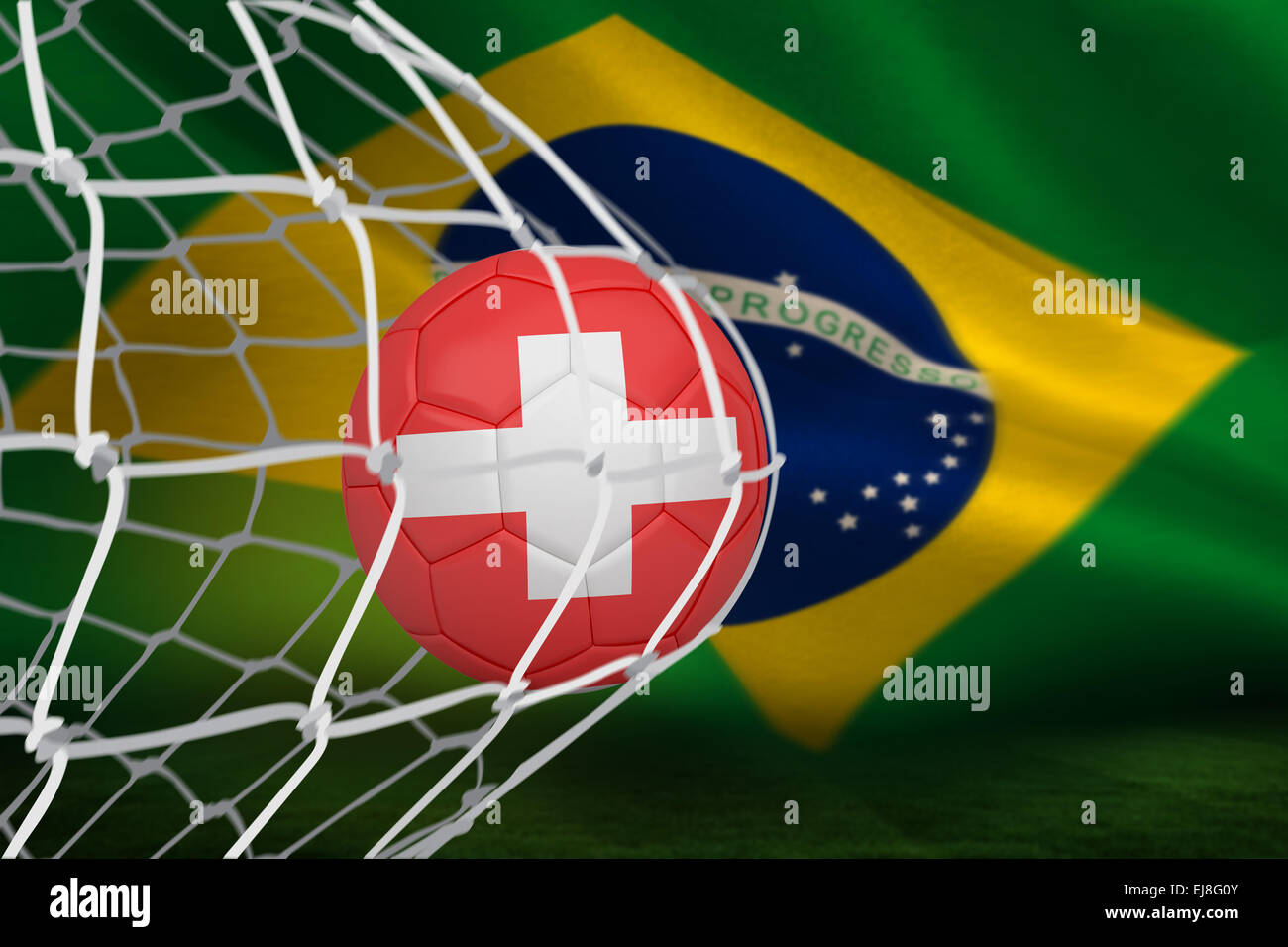 Football in swiss colours at back of net Stock Photo - Alamy