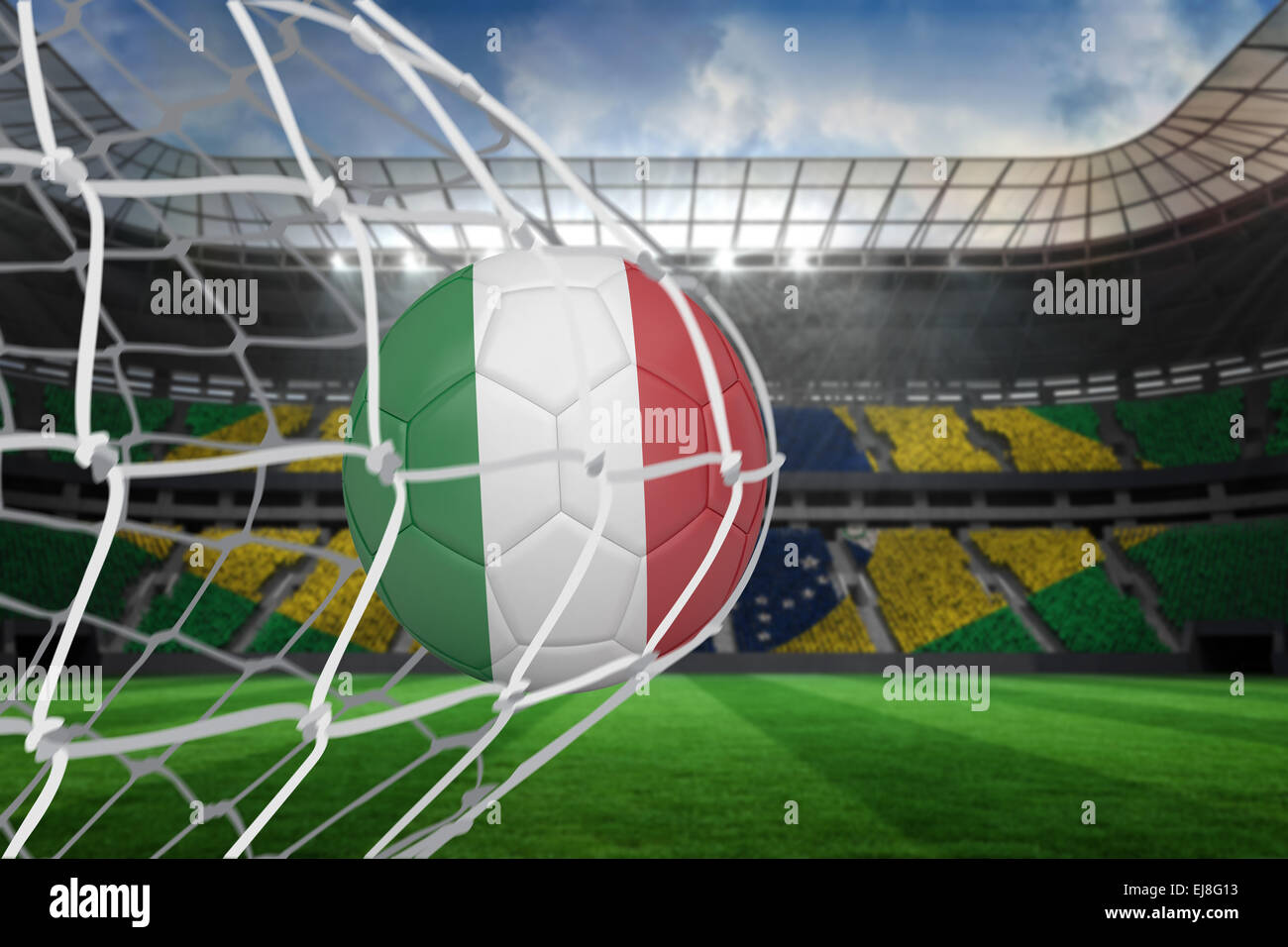 Football in italy colours at back of net Stock Photo - Alamy