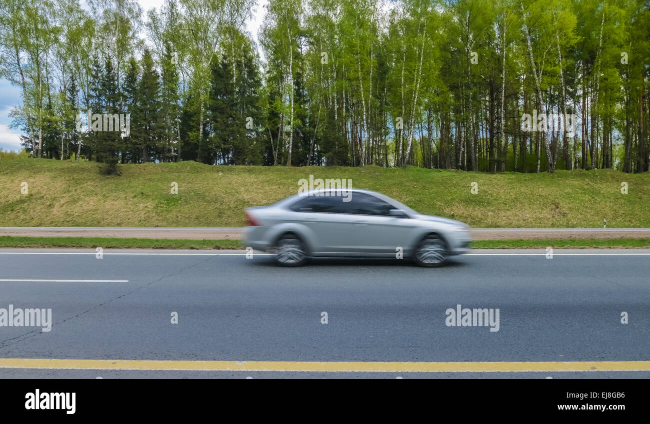 Car in motion Stock Photo - Alamy