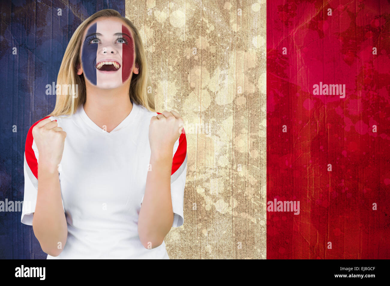Excited france fan in face paint cheering Stock Photo - Alamy