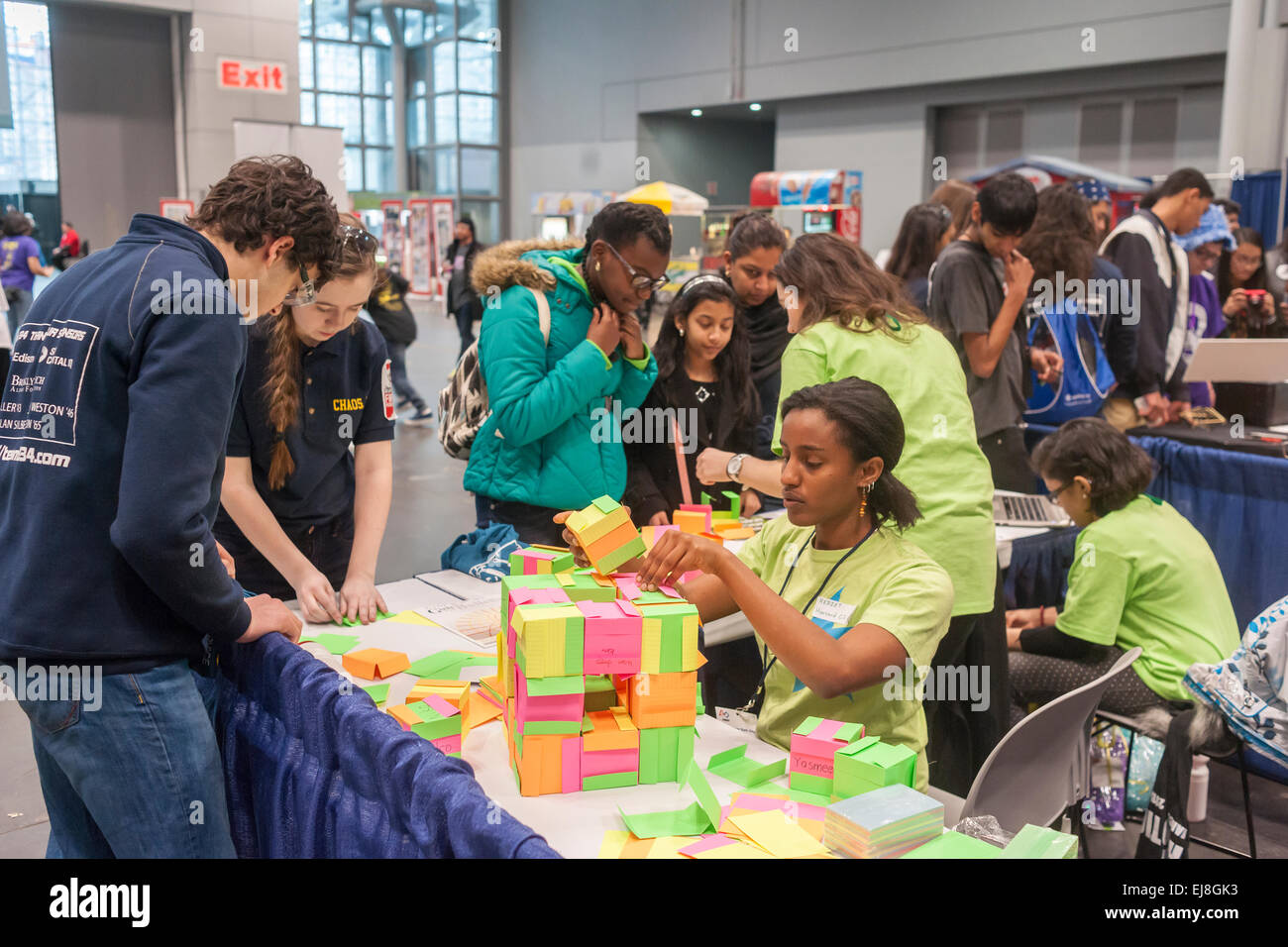 Participants visit the Girls' Angle booth, a math club at a Career Expo ...