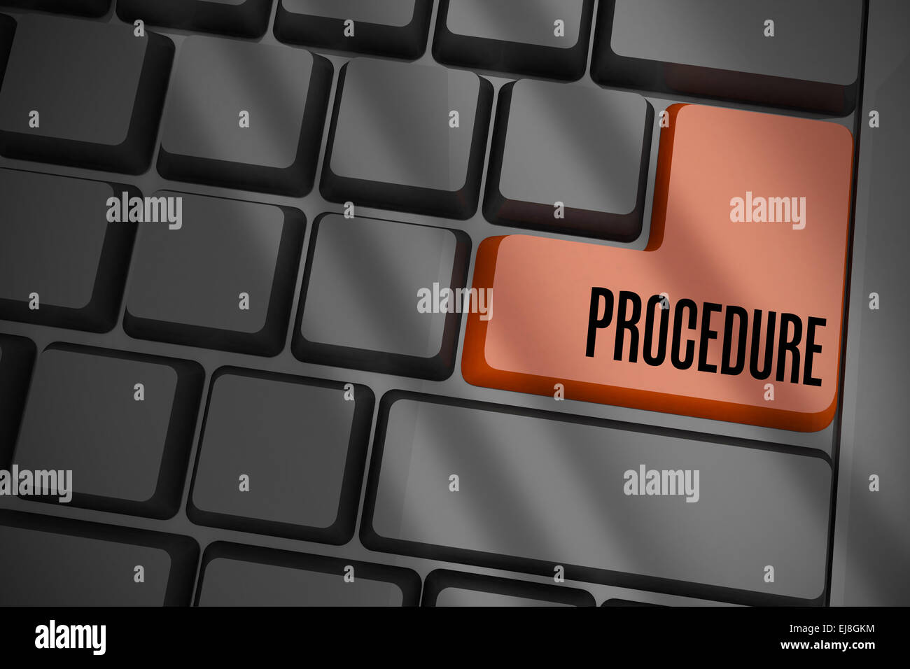 Procedure on black keyboard with brown key Stock Photo - Alamy
